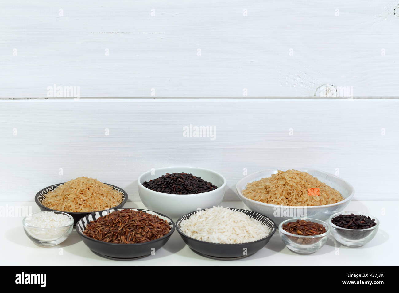 rice, different varieties of raw rice / space for text Stock Photo - Alamy