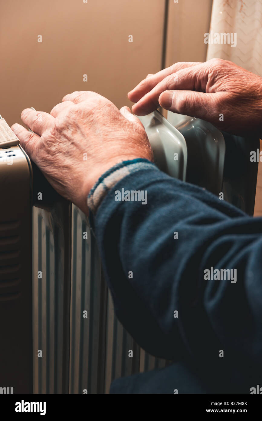 Elderly and bill and heater hi-res stock photography and images - Alamy