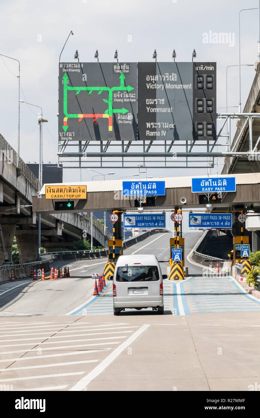 Cars passing through highway toll booths, Bangkok, Thailand Stock Photo ...