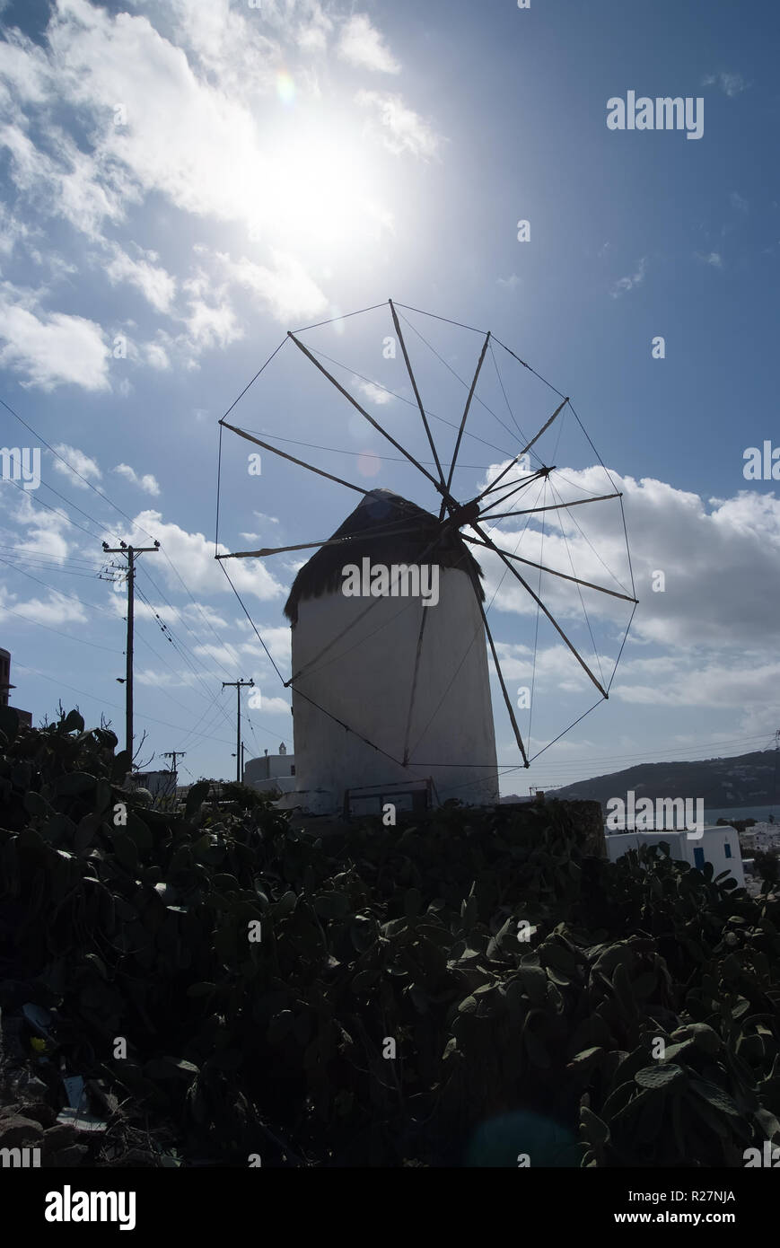 Old windmill in Mykonos, Greece. Whitewashed building with sail and ...
