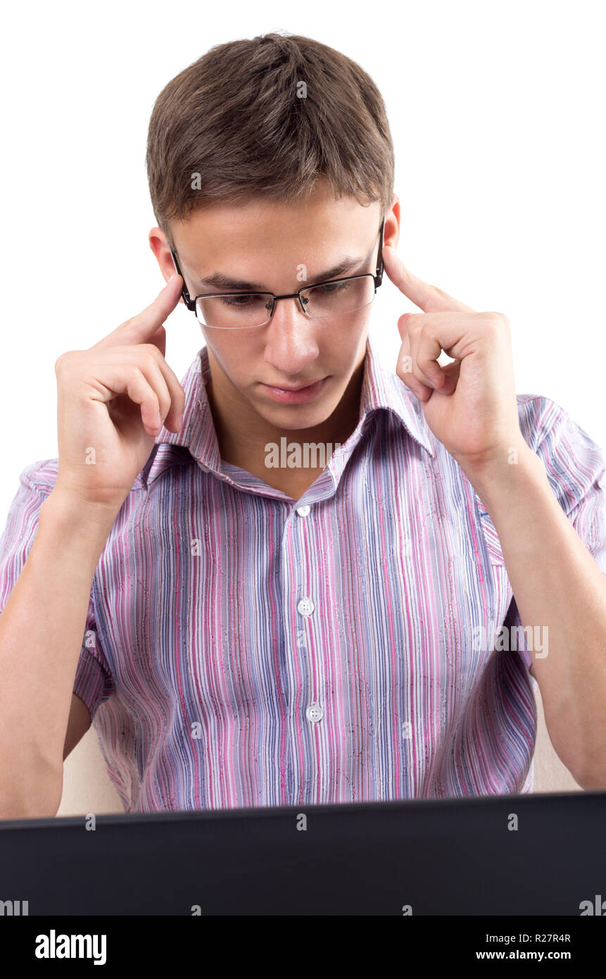 Young man working on computer laptop Stock Photo - Alamy