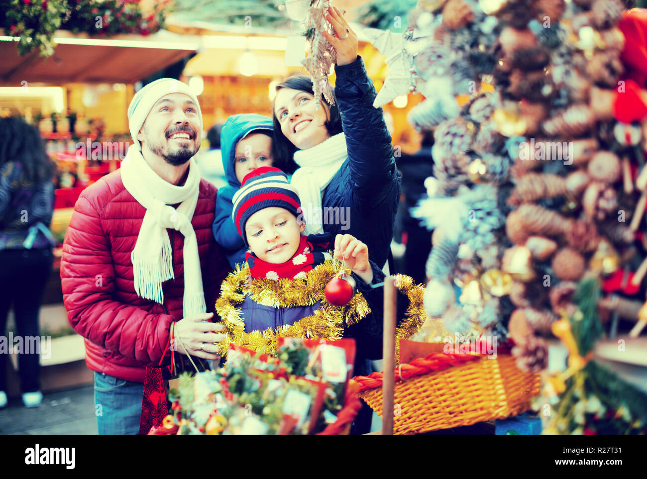 Ordinary smiling family purchasing hi-res stock photography and images ...