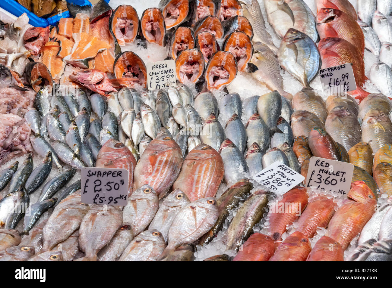 Fresh snapper, mullet and trout for sale at a market in London Stock ...