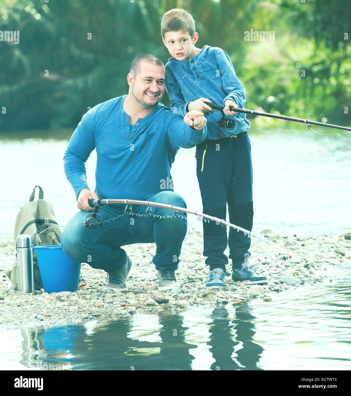Positive man son fishing hi-res stock photography and images - Alamy