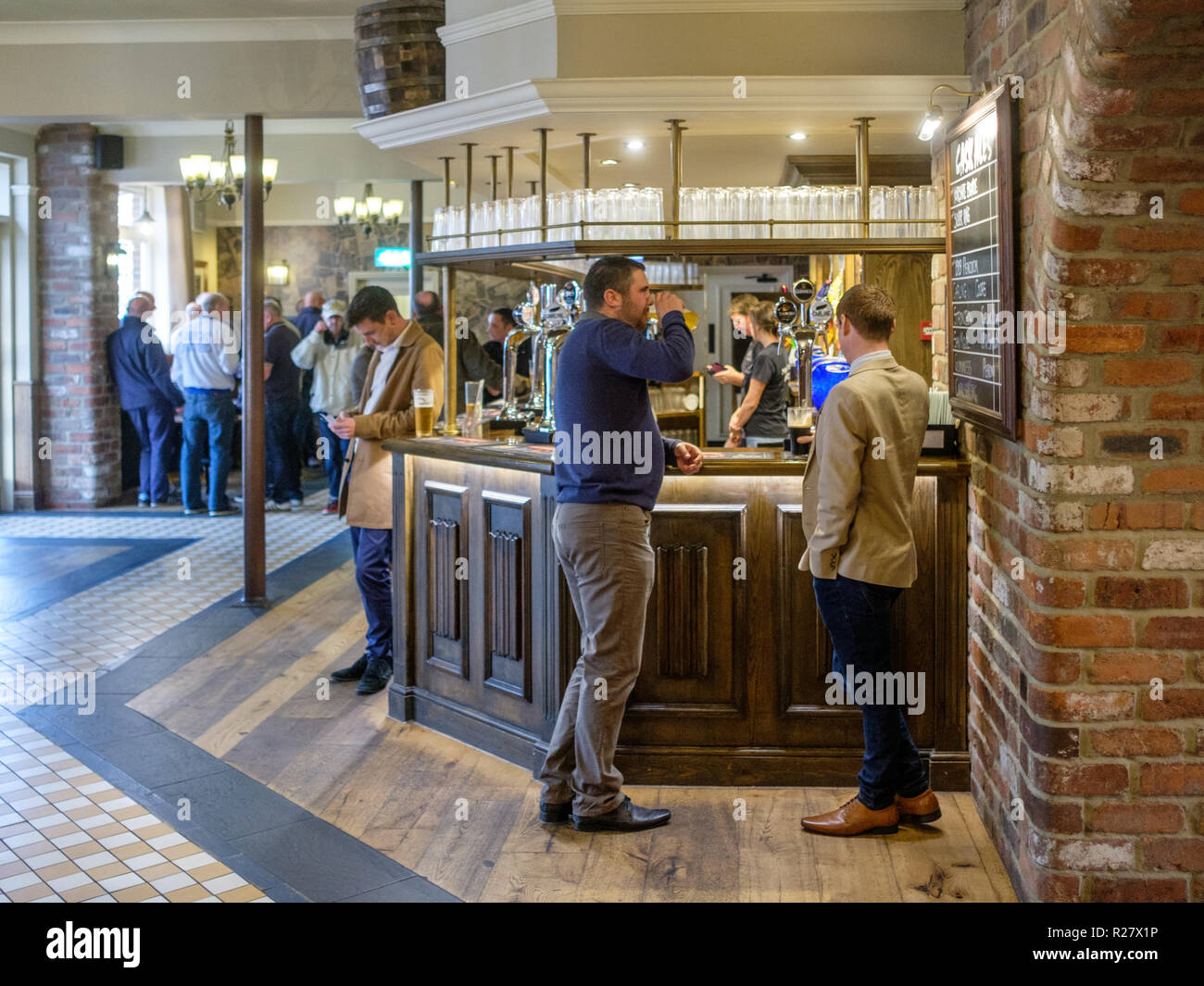 Football fans outside pub hi-res stock photography and images - Alamy