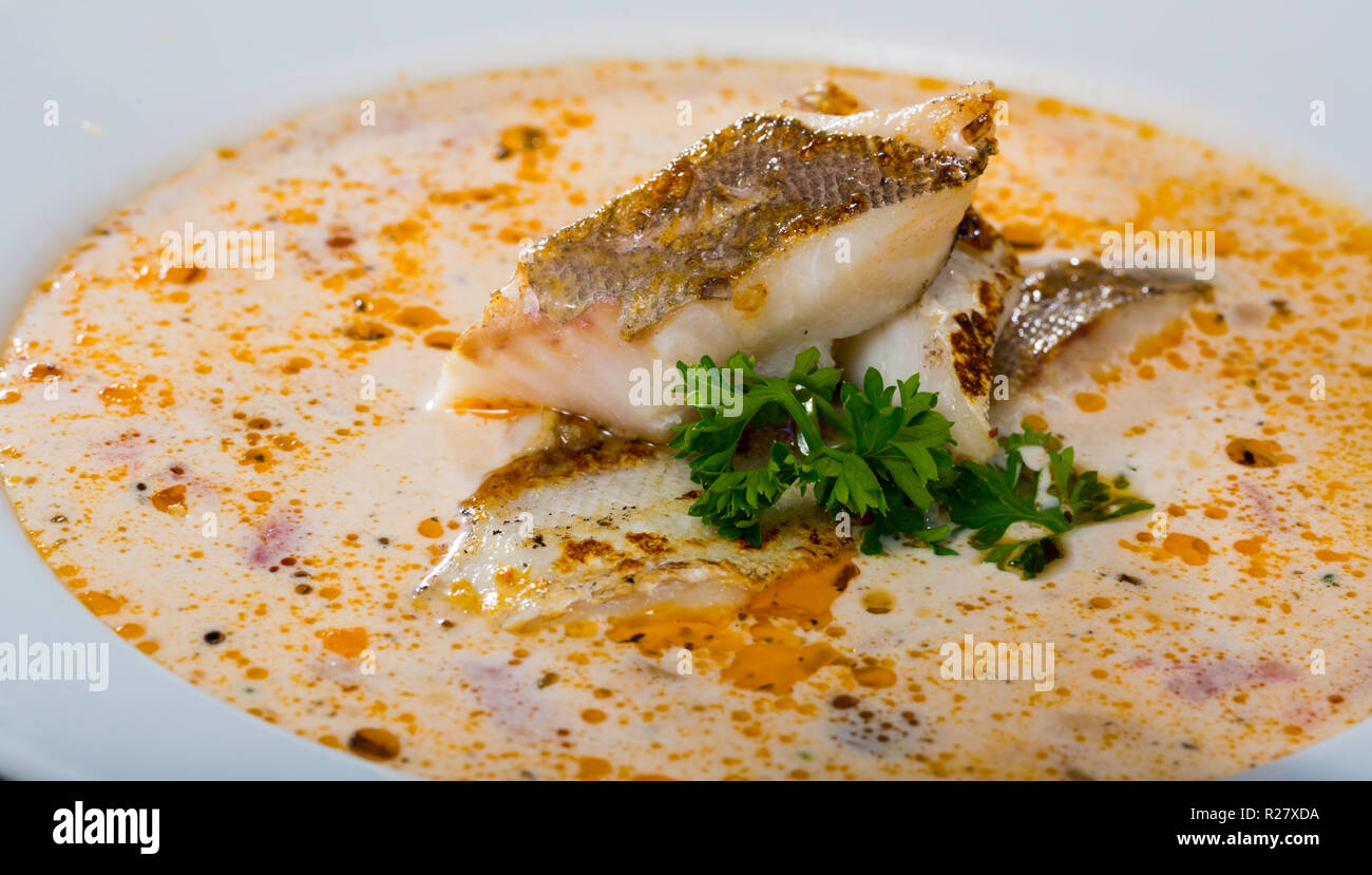 Authentic dish of Norwegian cuisine - Cod chowder with vegetables Stock ...