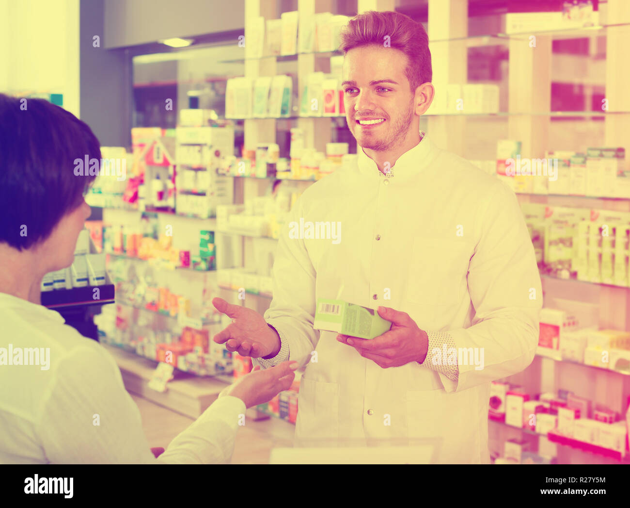 Girl wearing chemist uniform hi-res stock photography and images - Alamy