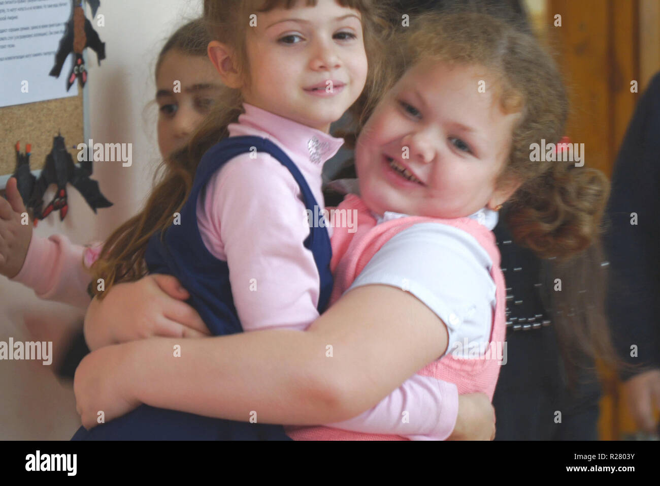 Two girls playing with each other Stock Photo - Alamy