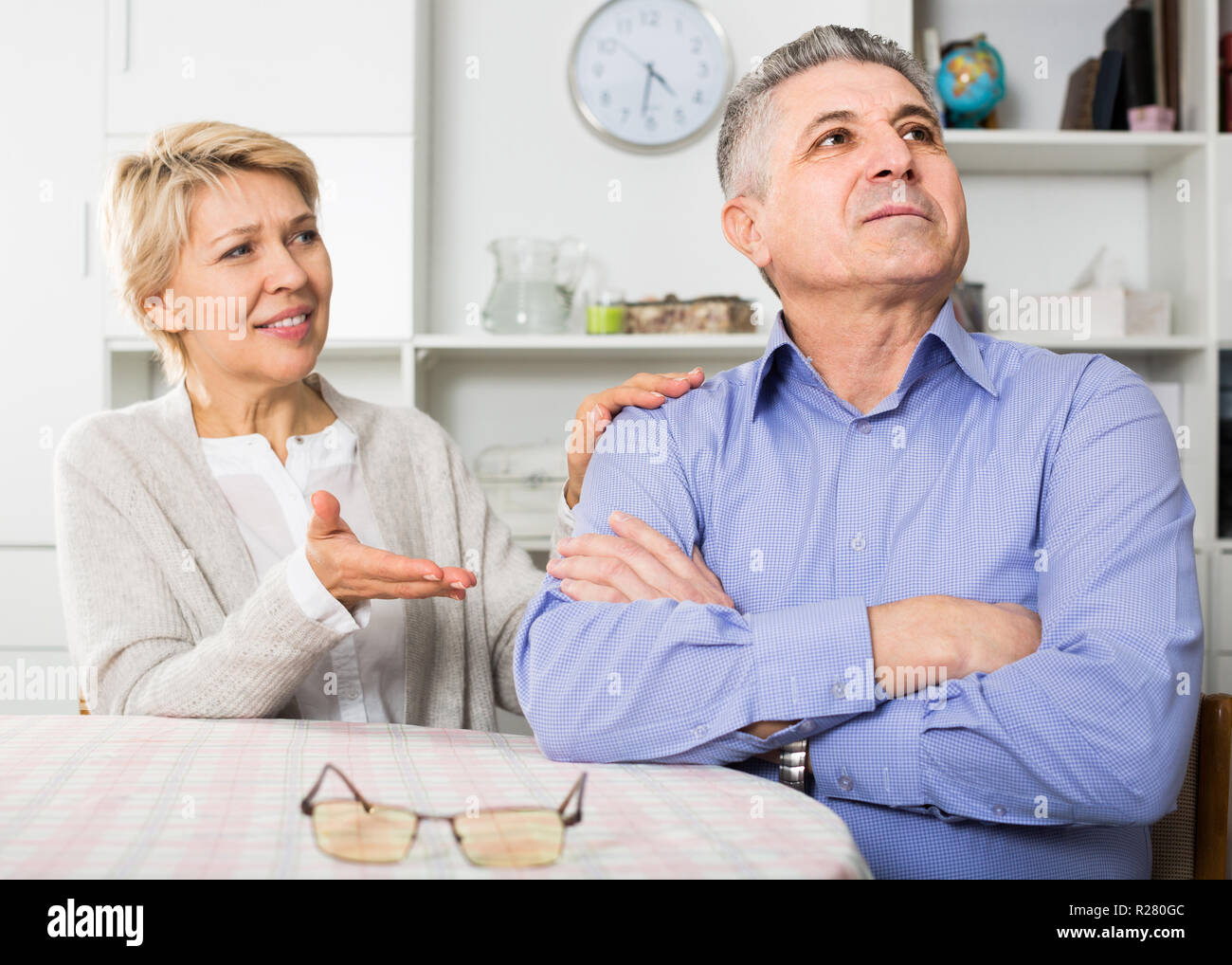 mature italian husband and wife arguing with each other and try to ...