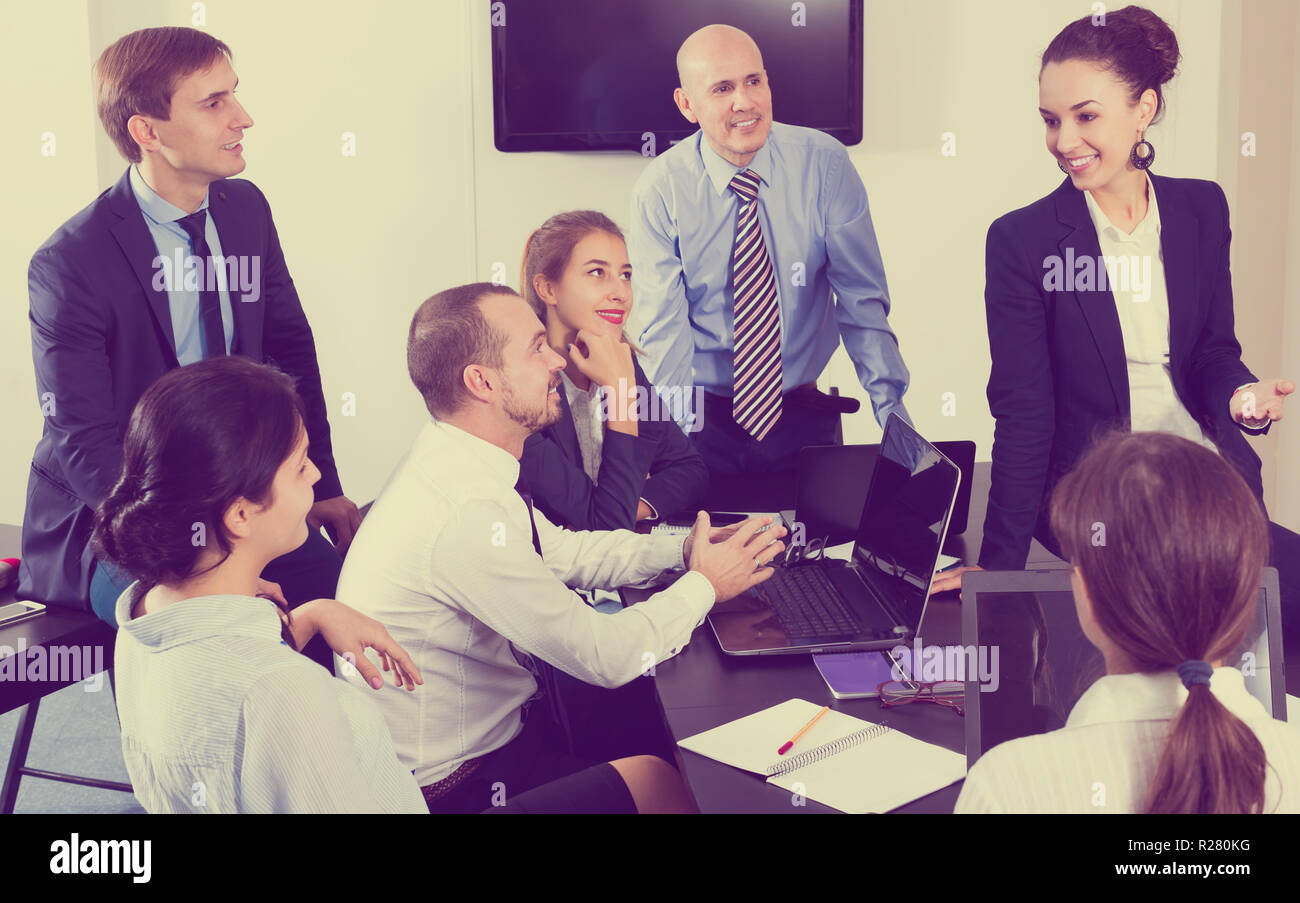 Managers talking about business project together during coffee break in ...