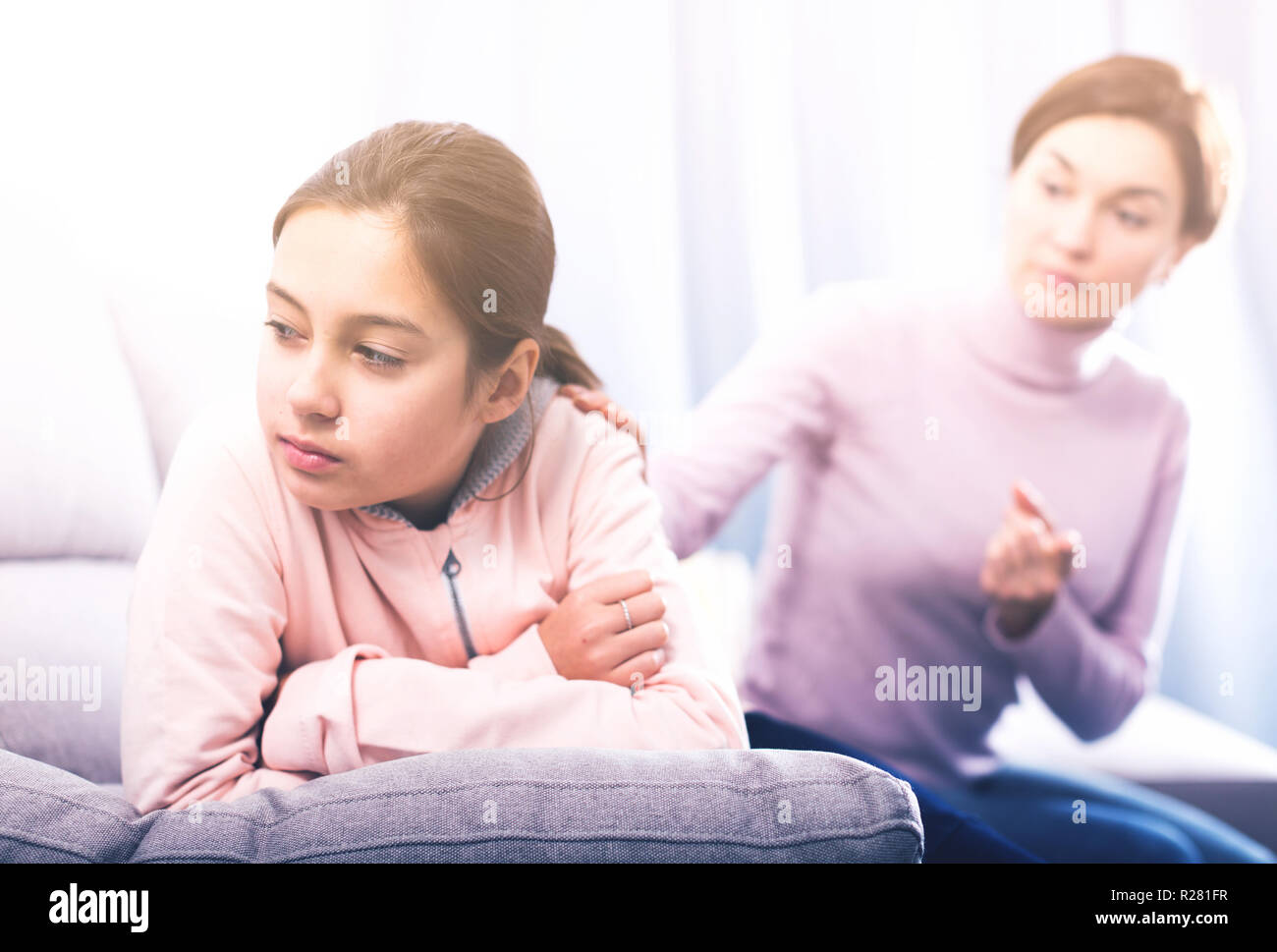Mother scolding his teenage daughter for wrong things and bad behavior ...