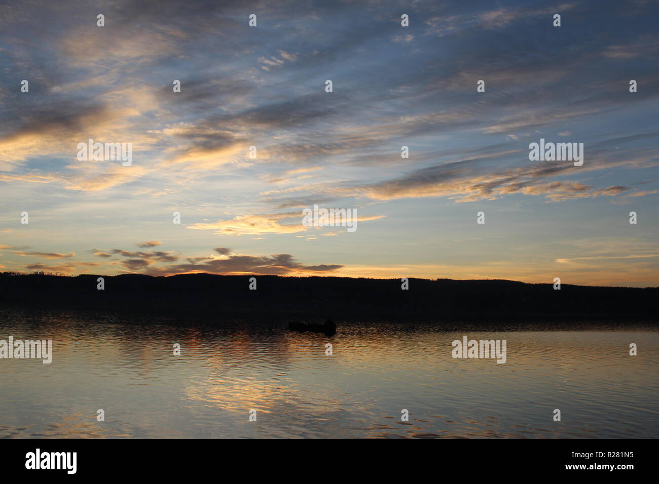 Beautiful sunset over lake Stock Photo - Alamy