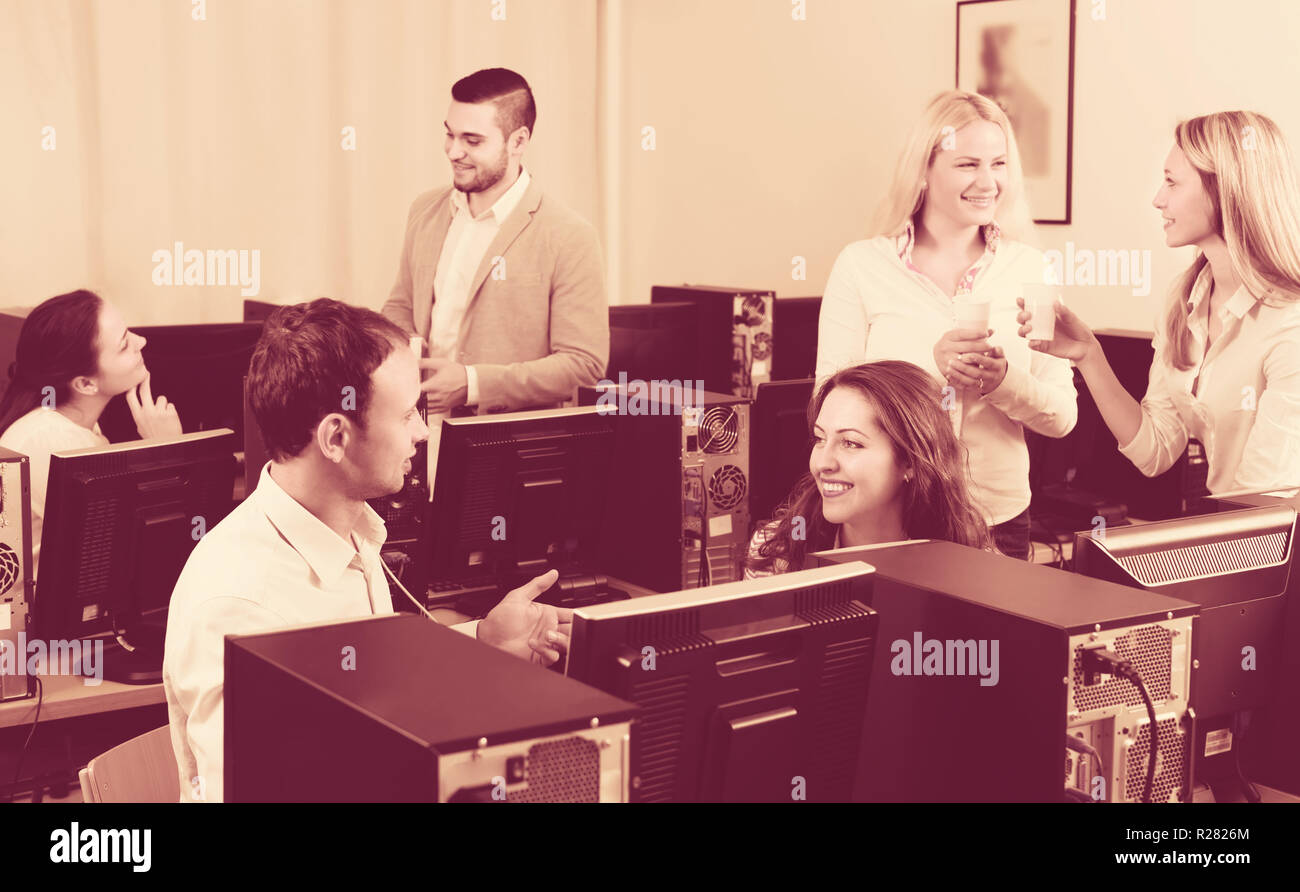 Positive business team celebrating project close-out in office ...