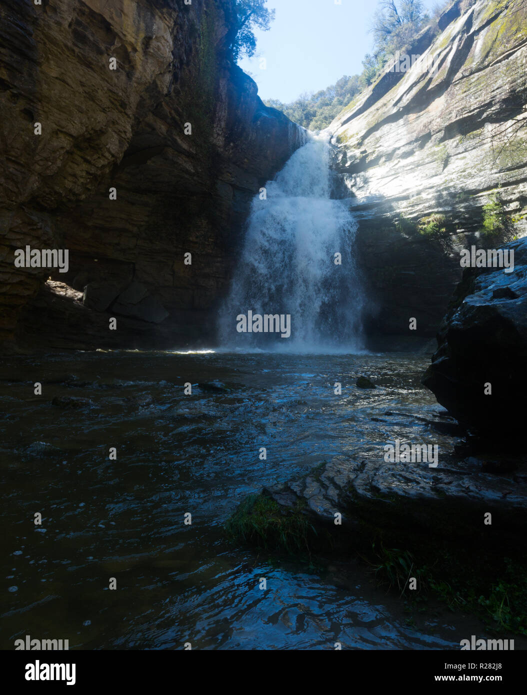 Waterfall La Foradada de Cantonigros surrounded by beautiful forests ...