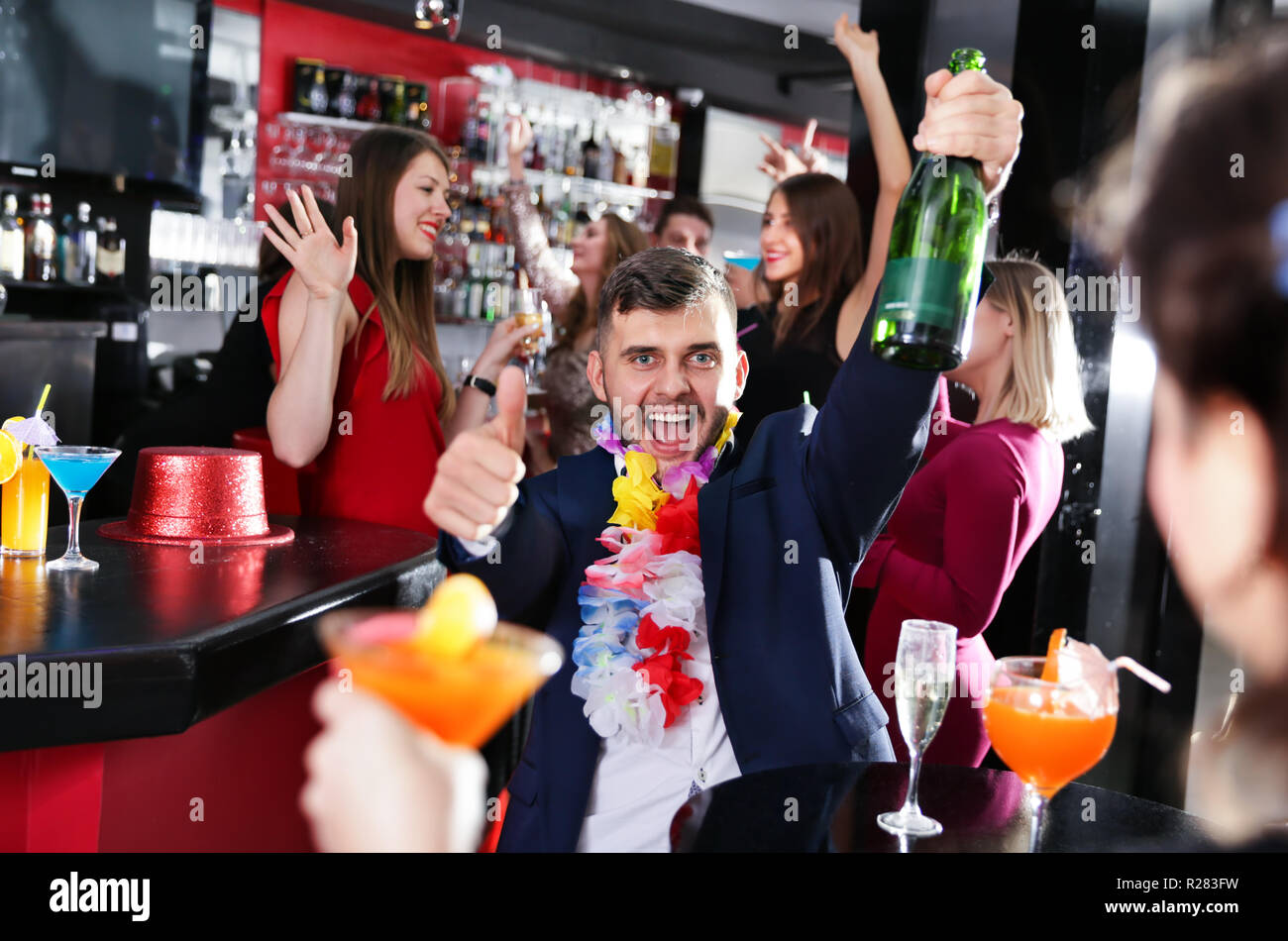 Partying at a bar hi-res stock photography and images - Alamy