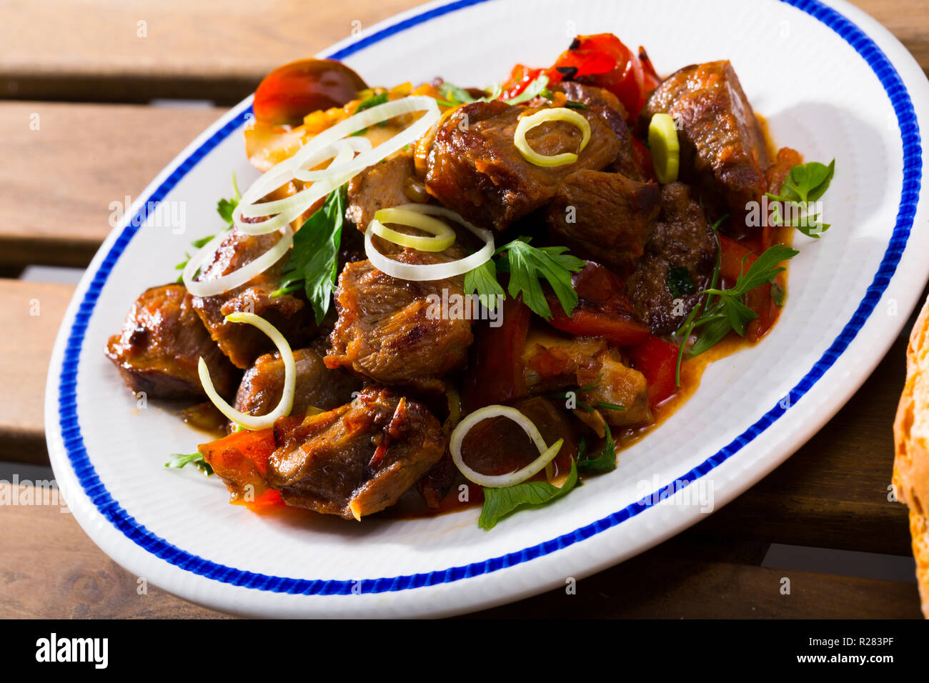 Traditional Bulgarian Kavarma - stewed marinaded meat with vegetables ...