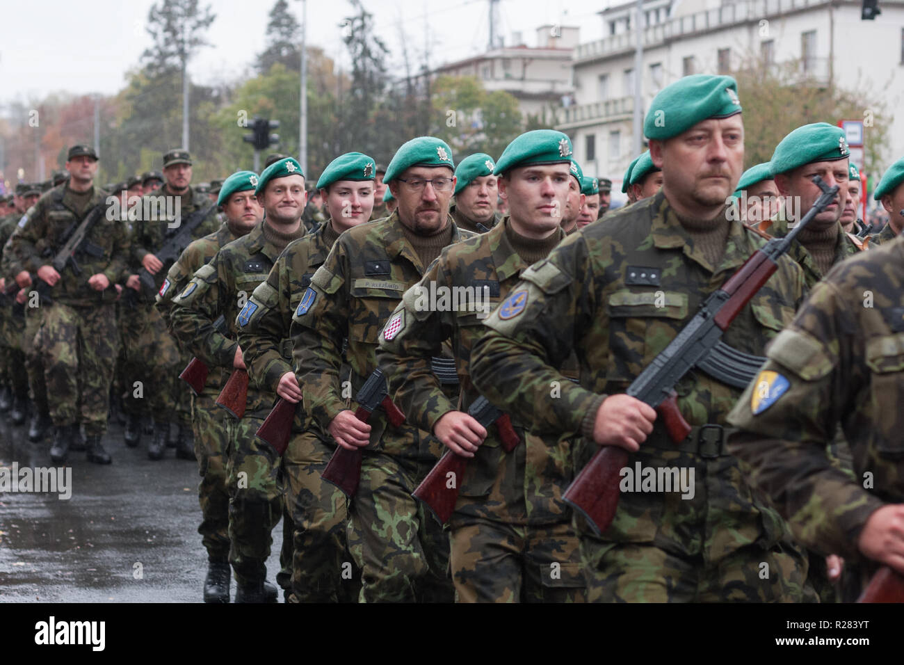 European street, Prague-October 28, 2018: One woman soldier between ...