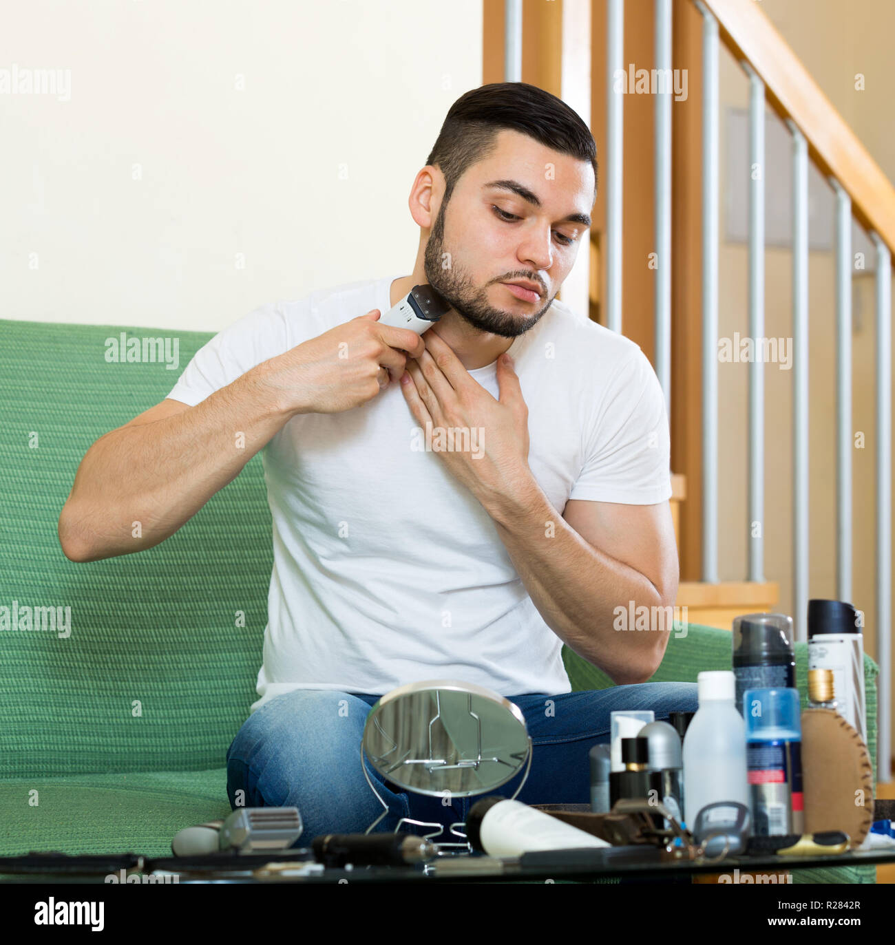Young guy shaving trimmer hi-res stock photography and images - Alamy