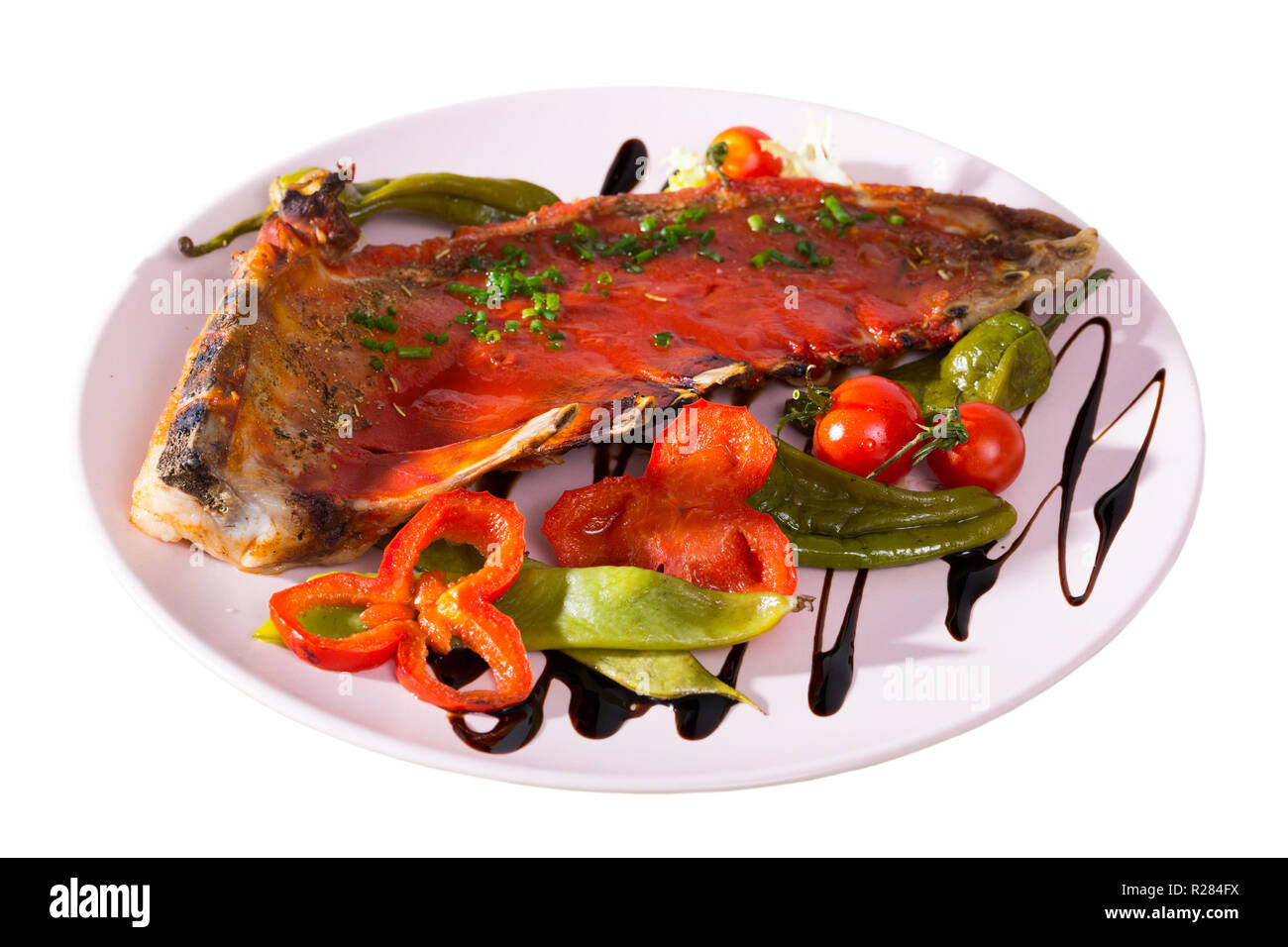 Appetizing mutton ribs baked under hot tomato sauce with chili pepper ...