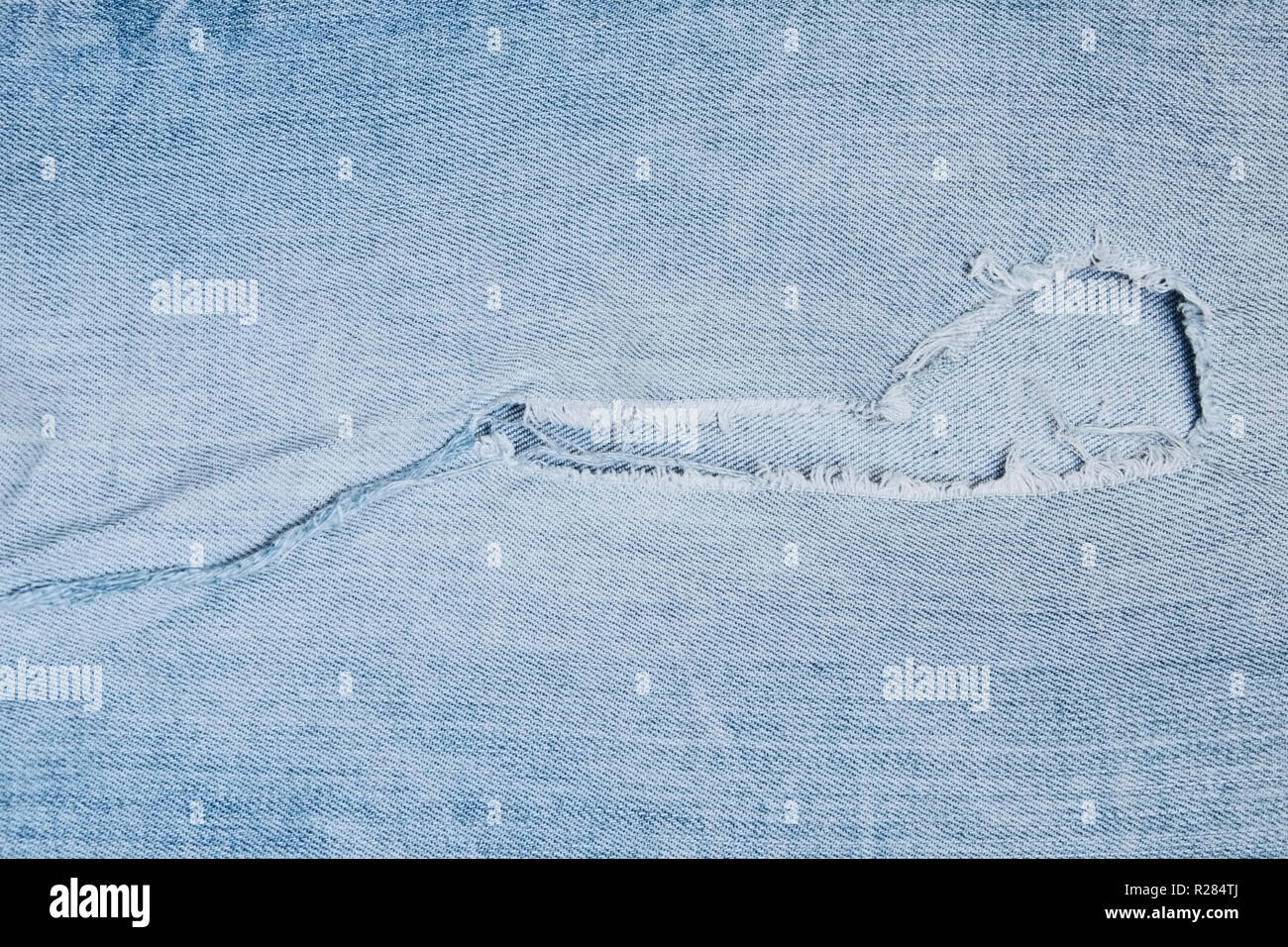 Ripped fabric hi-res stock photography and images - Alamy