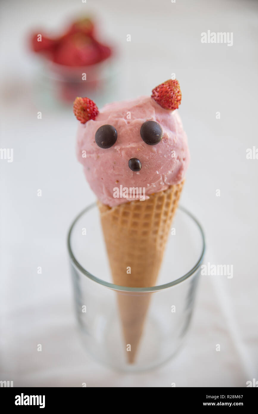 Strawberry ice cream cone Stock Photo - Alamy