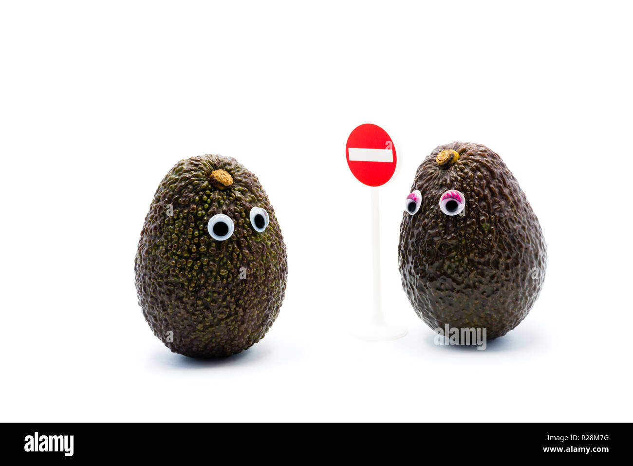 Romantic avocados couple with googly eyes as man and woman, traffic no ...
