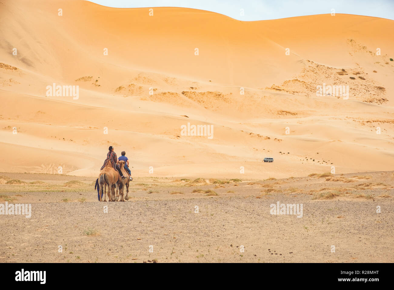 Desert with camel herders hi-res stock photography and images - Alamy