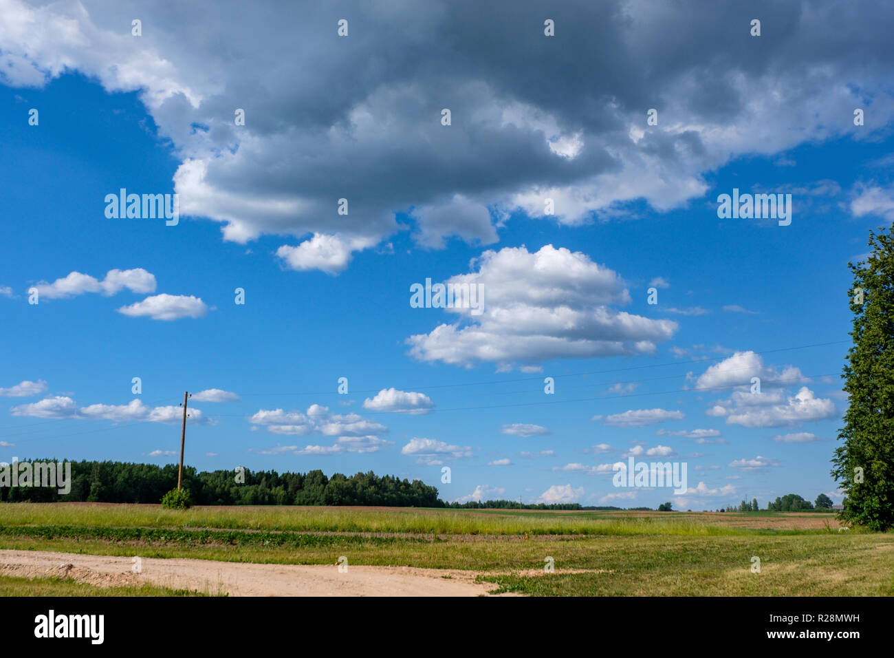 storm clouds forming over the countryside and fields with roads Stock ...