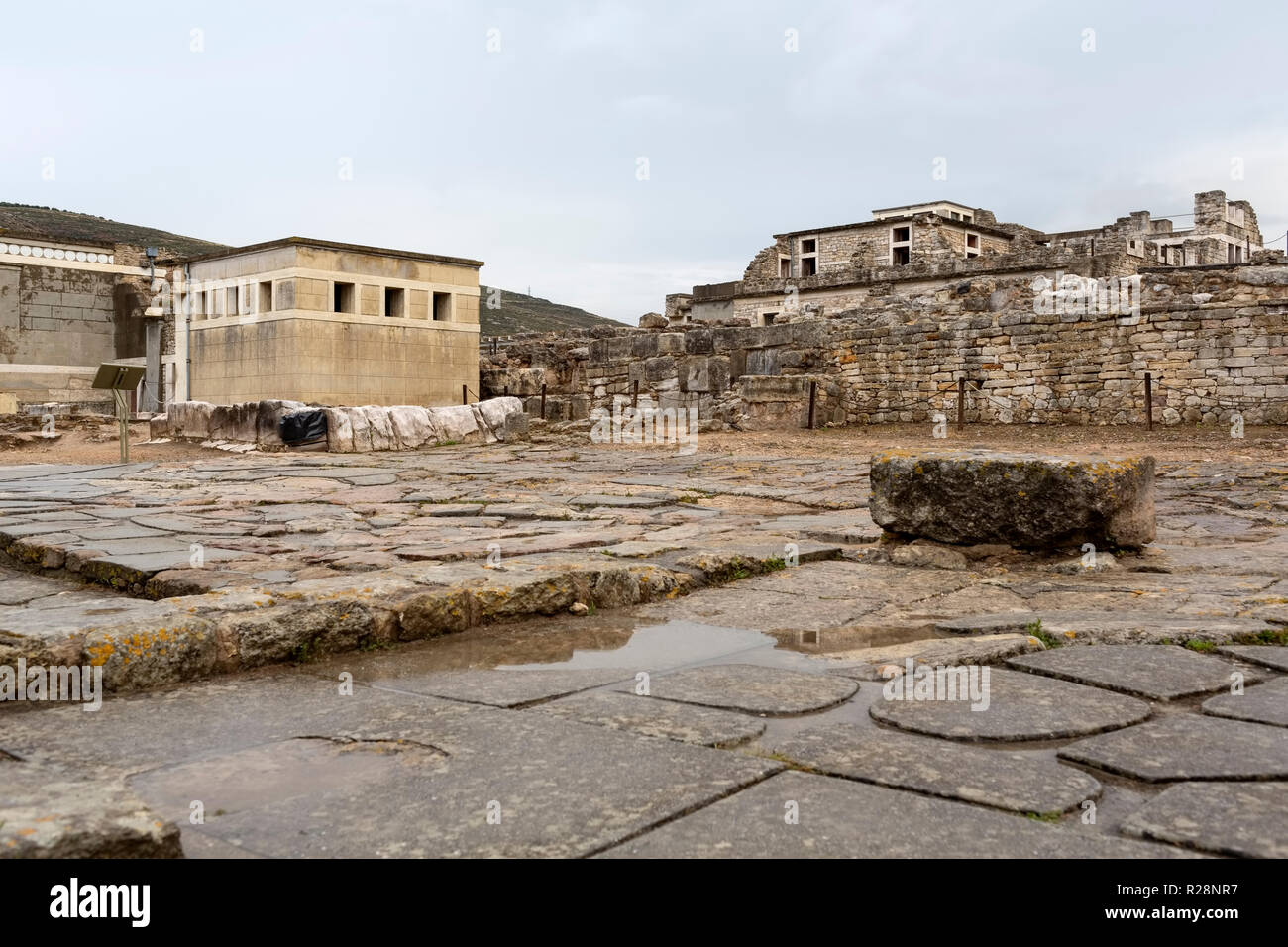 Rose on the wall of an ancient temple on the island of Crete, Greece ...