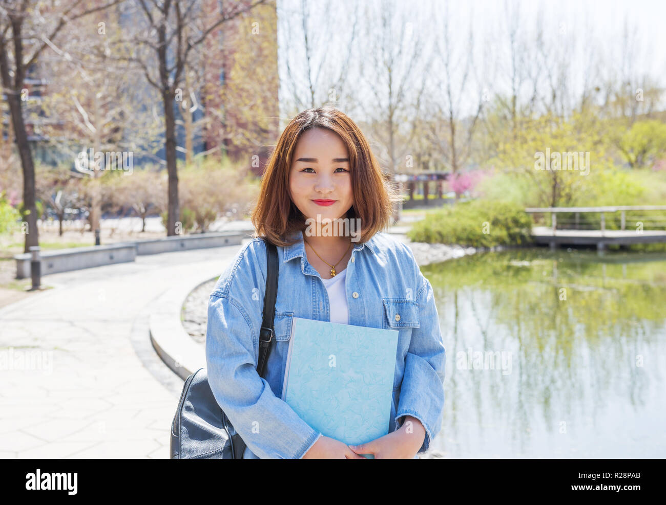 A portrait of an Asian college student at campus Stock Photo - Alamy