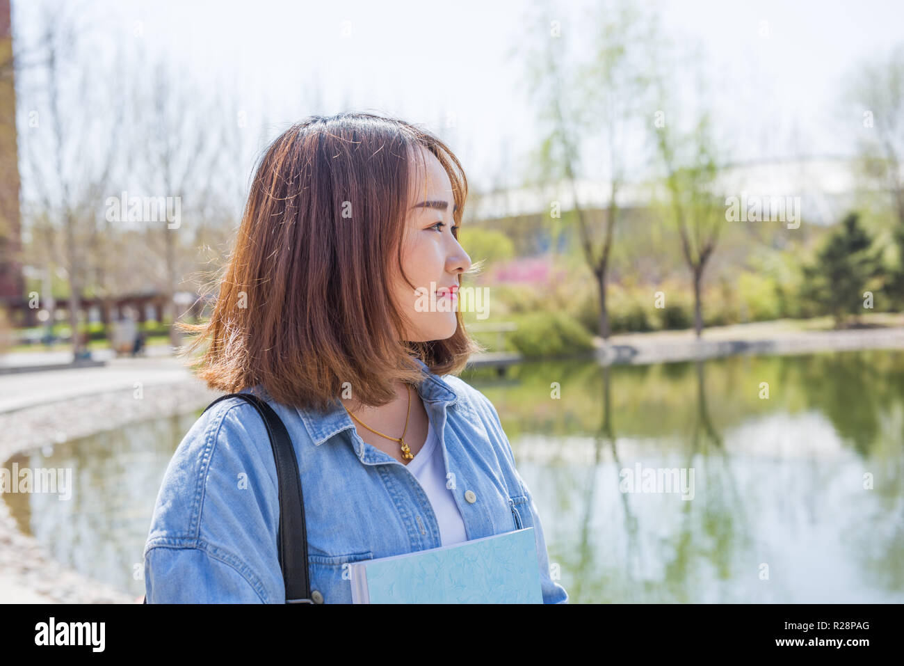 A portrait of an Asian college student at campus Stock Photo - Alamy