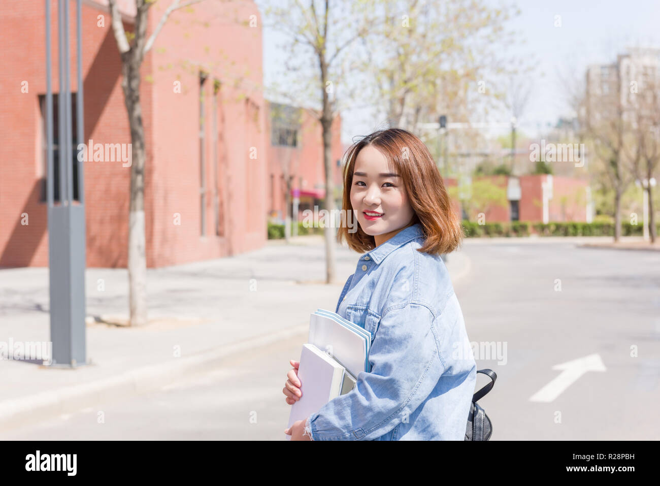 A portrait of an Asian college student at campus Stock Photo - Alamy