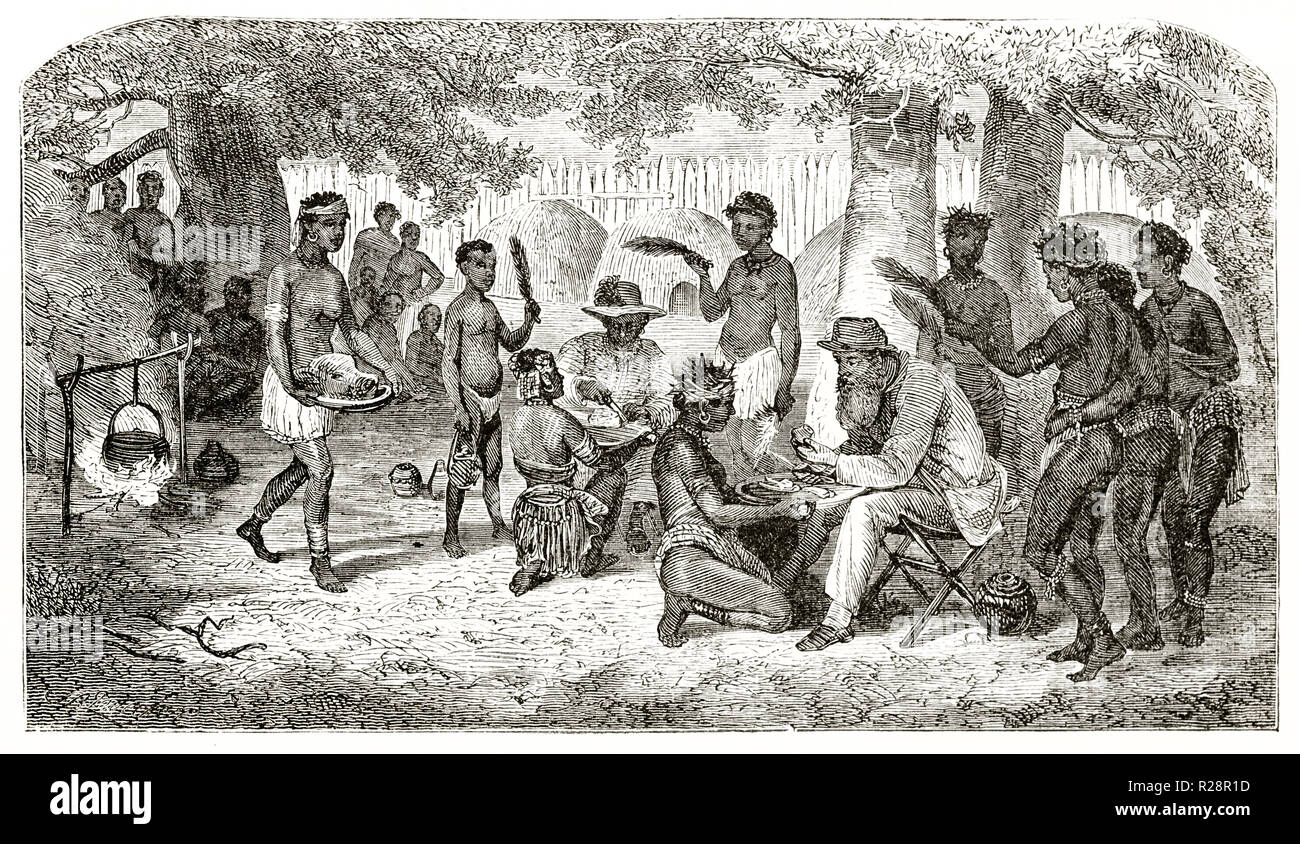 Old illustration of British explorer W.C. Baldwin dining with south ...