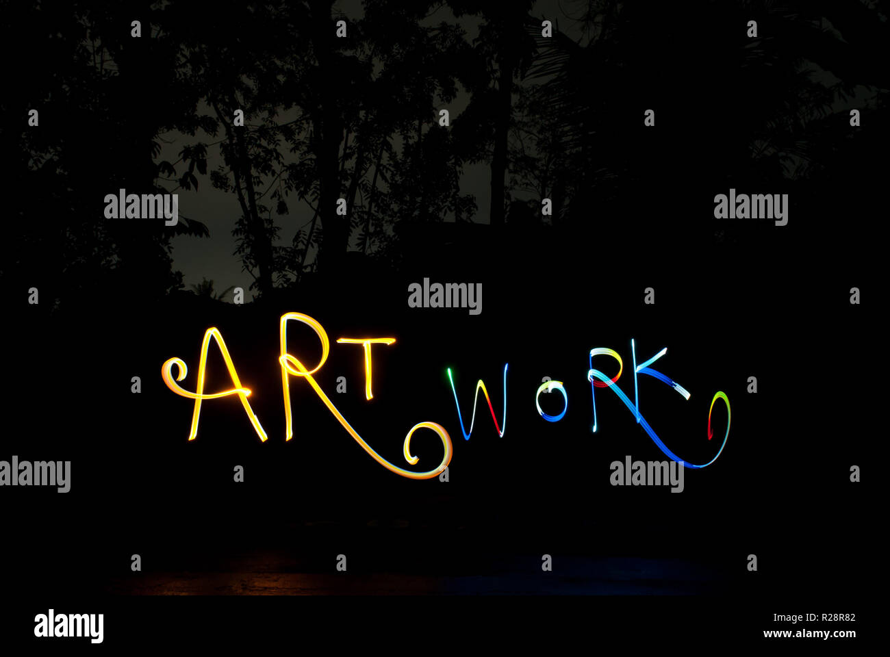 Luxury Hand writing art work with golden light at night Stock Photo - Alamy