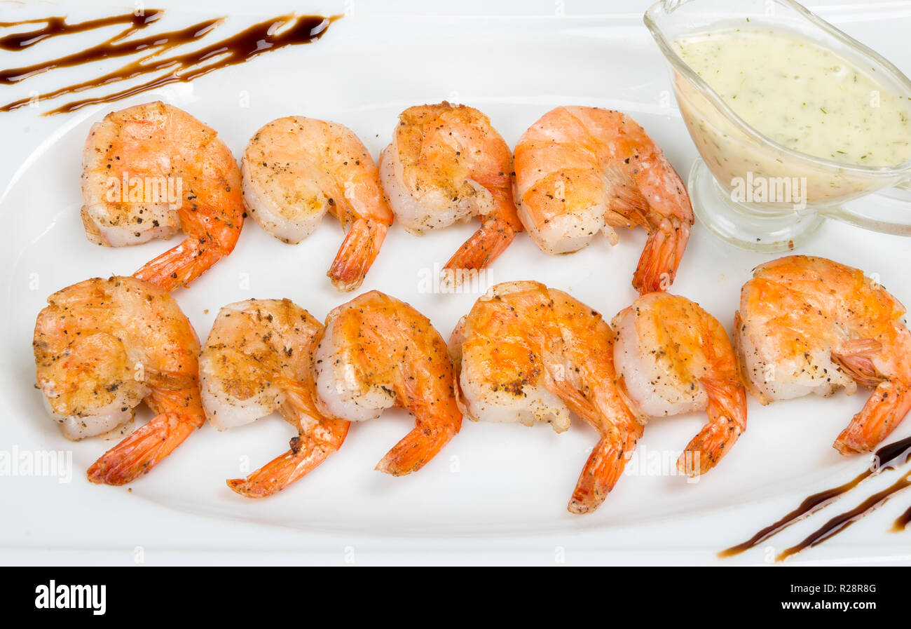 Seafood. Fast food. Royal Shrimps with Milk Sauce Stock Photo - Alamy