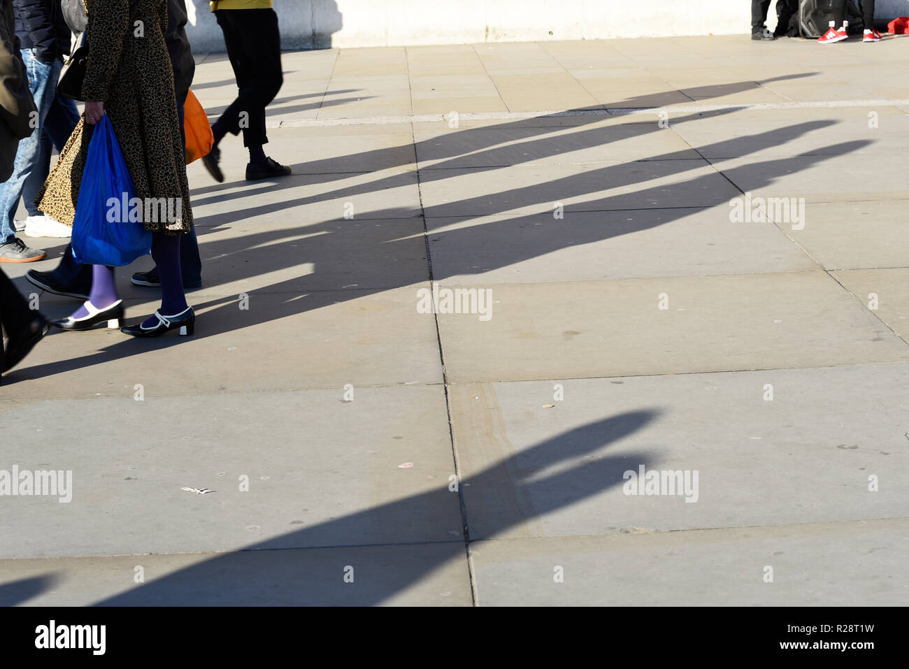 Shadows people walking on pavement hi-res stock photography and images ...