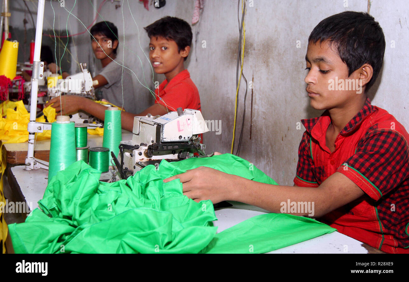 Child garment labour hi-res stock photography and images - Alamy