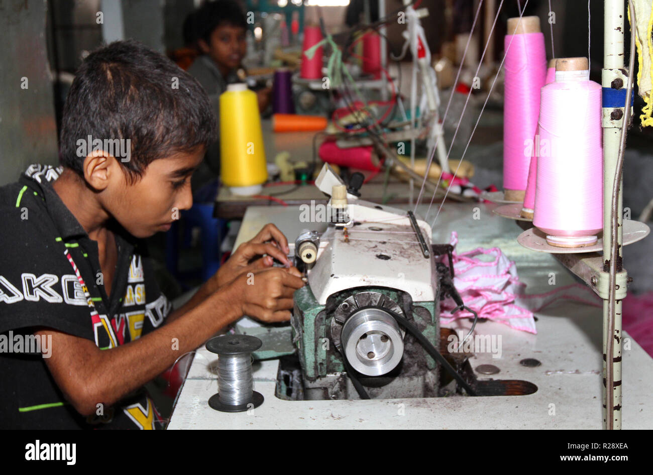 Dhaka, Bangladesh - December 08, 2014: Bangladeshi Childs working in a ...