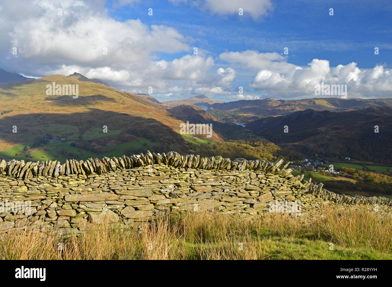 Views looking over Beddgelert on slopes to summit of Moel Hebog Stock ...