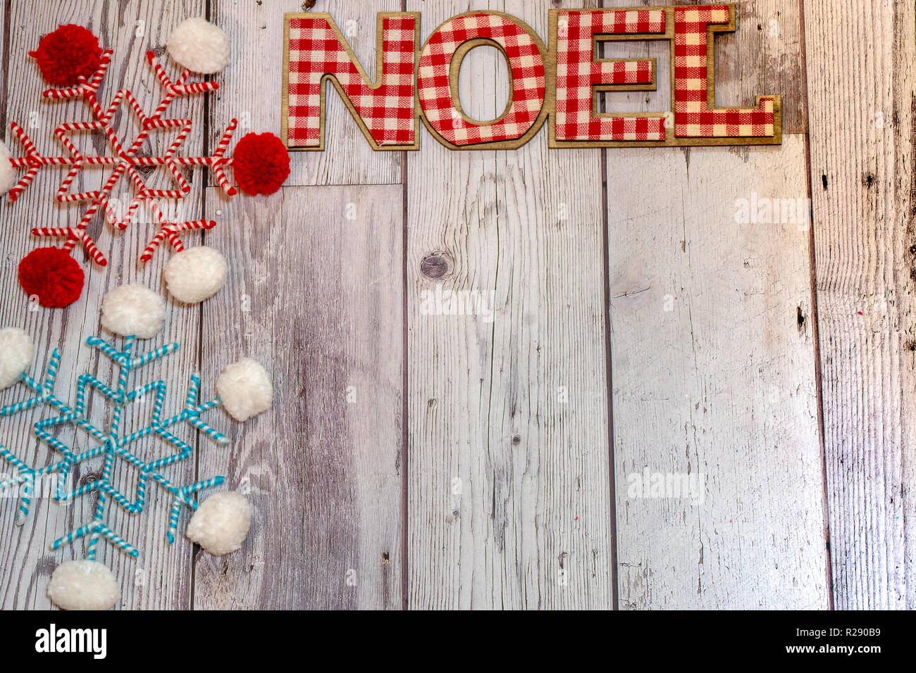 Noel Christmas holiday background with wood backdrop. Rustic christmas ...
