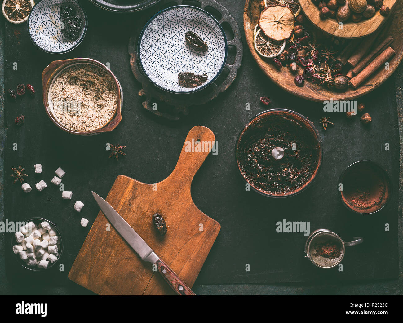 Healthy vegan homemade truffle mixture in mixer with dates, dried ...