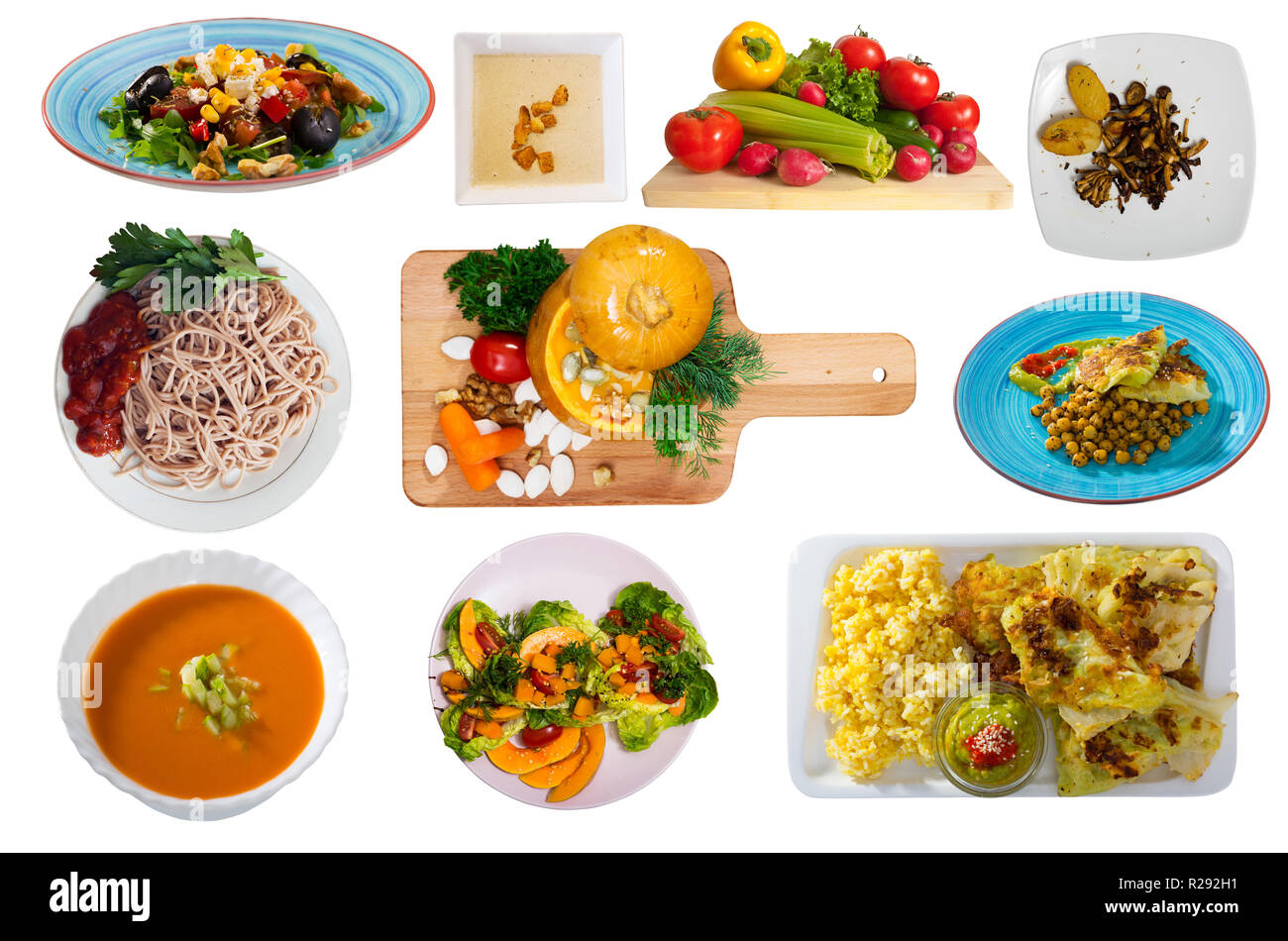 Top view of many plates with different vegetarian food isolated on ...