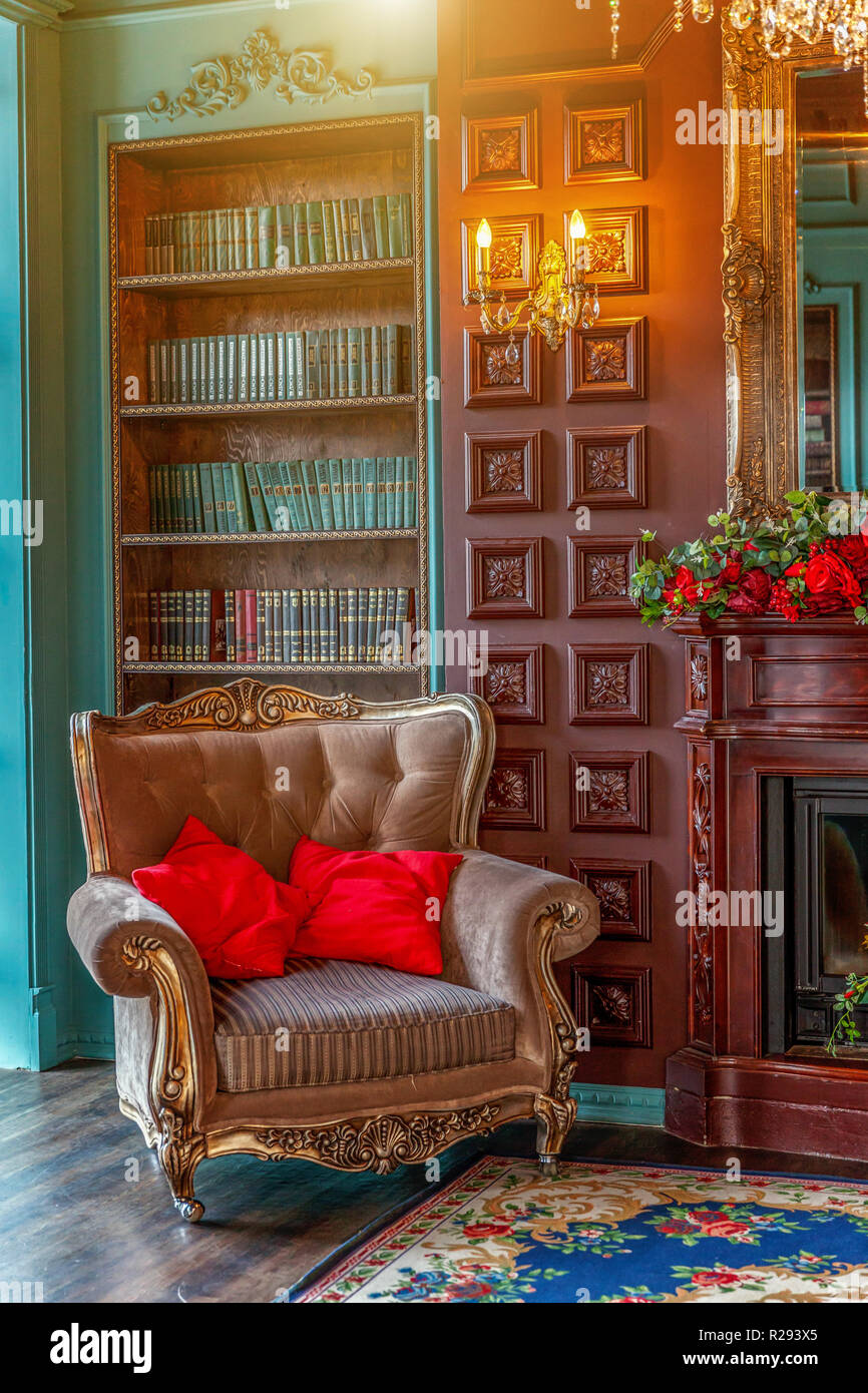 Luxury classic interior of home library. Sitting room with bookshelf ...