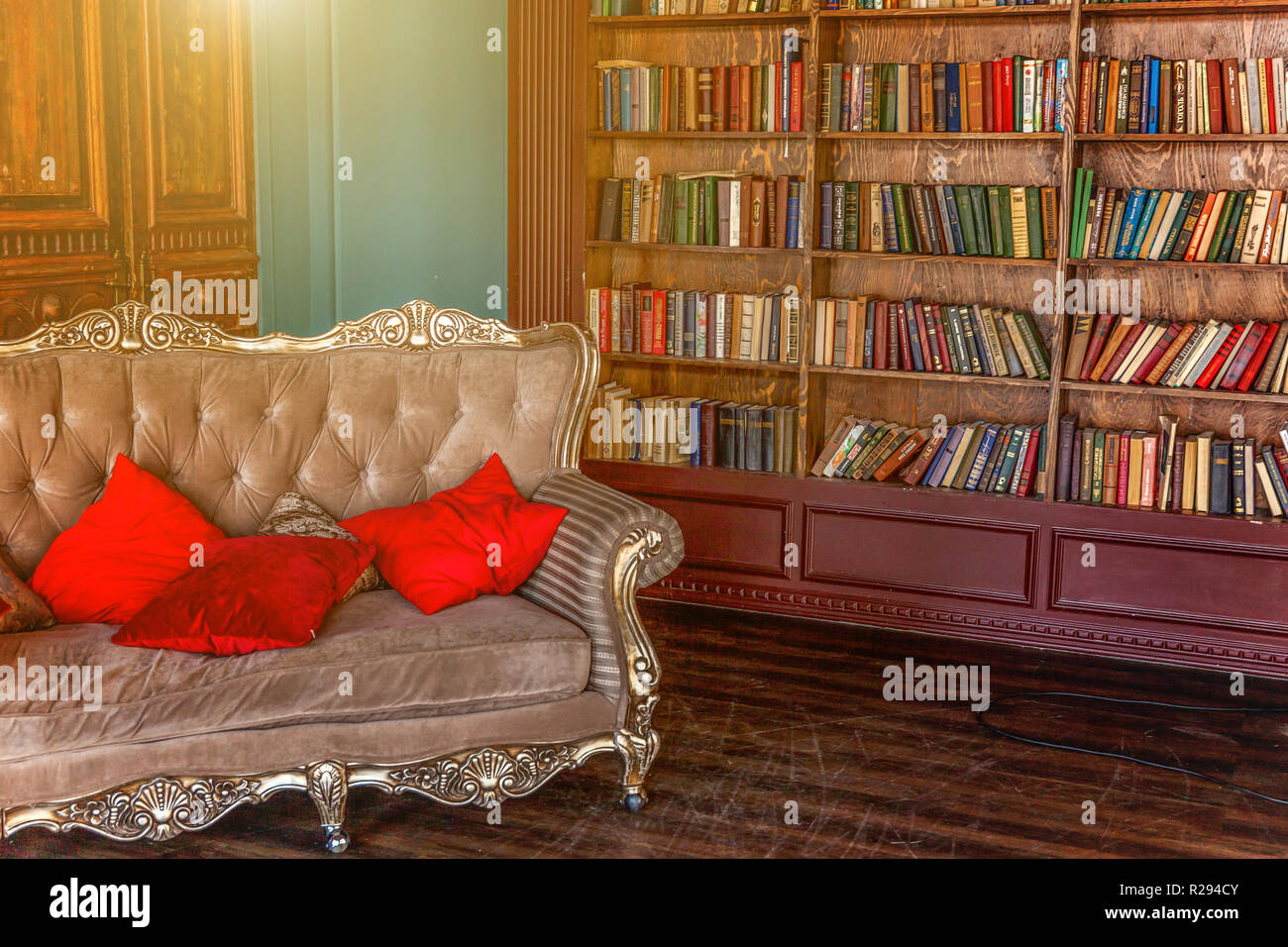 Luxury classic interior of home library. Sitting room with bookshelf ...