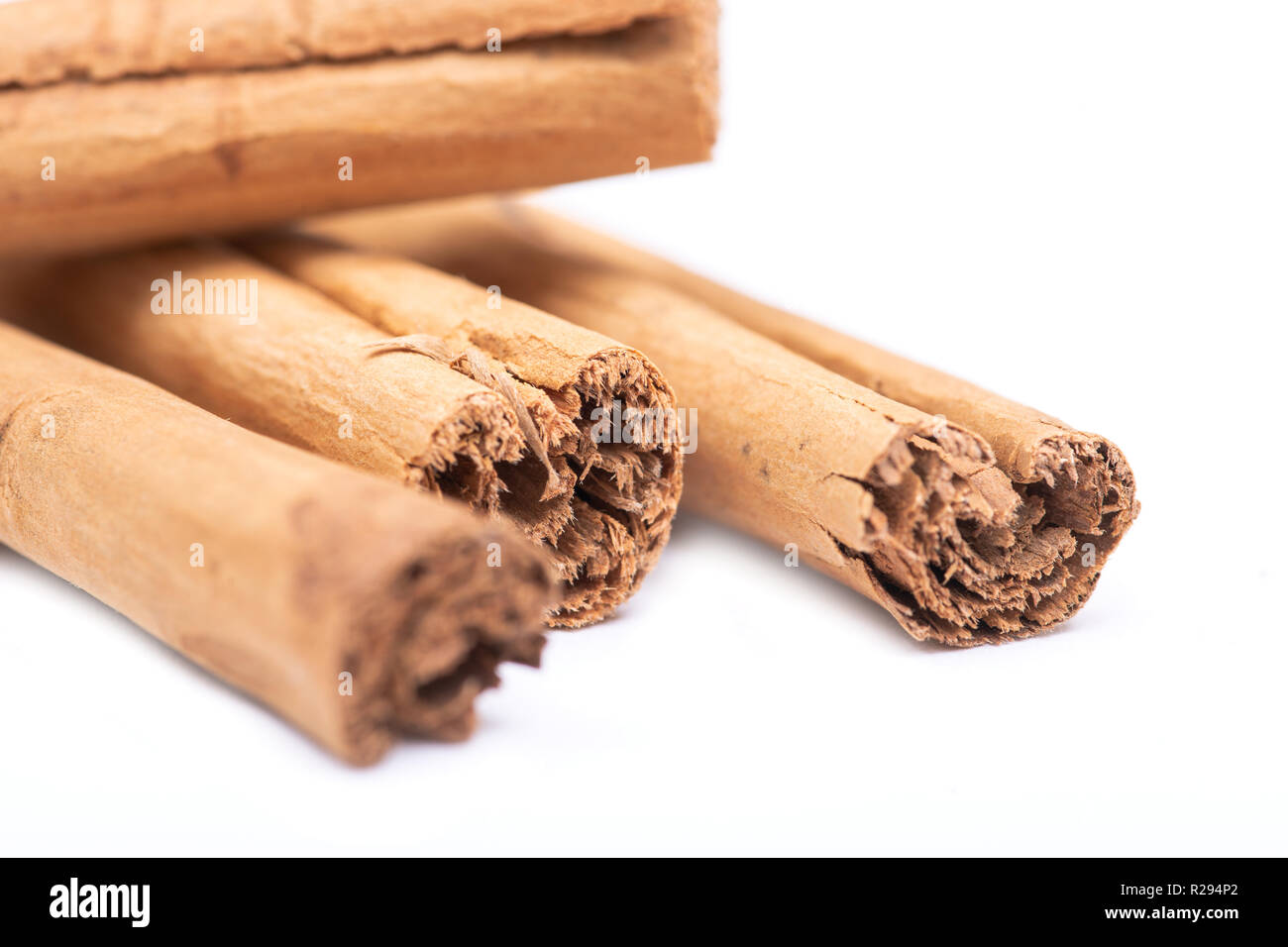 Cinnamon sticks tied with jute rope isolated on white background Stock ...
