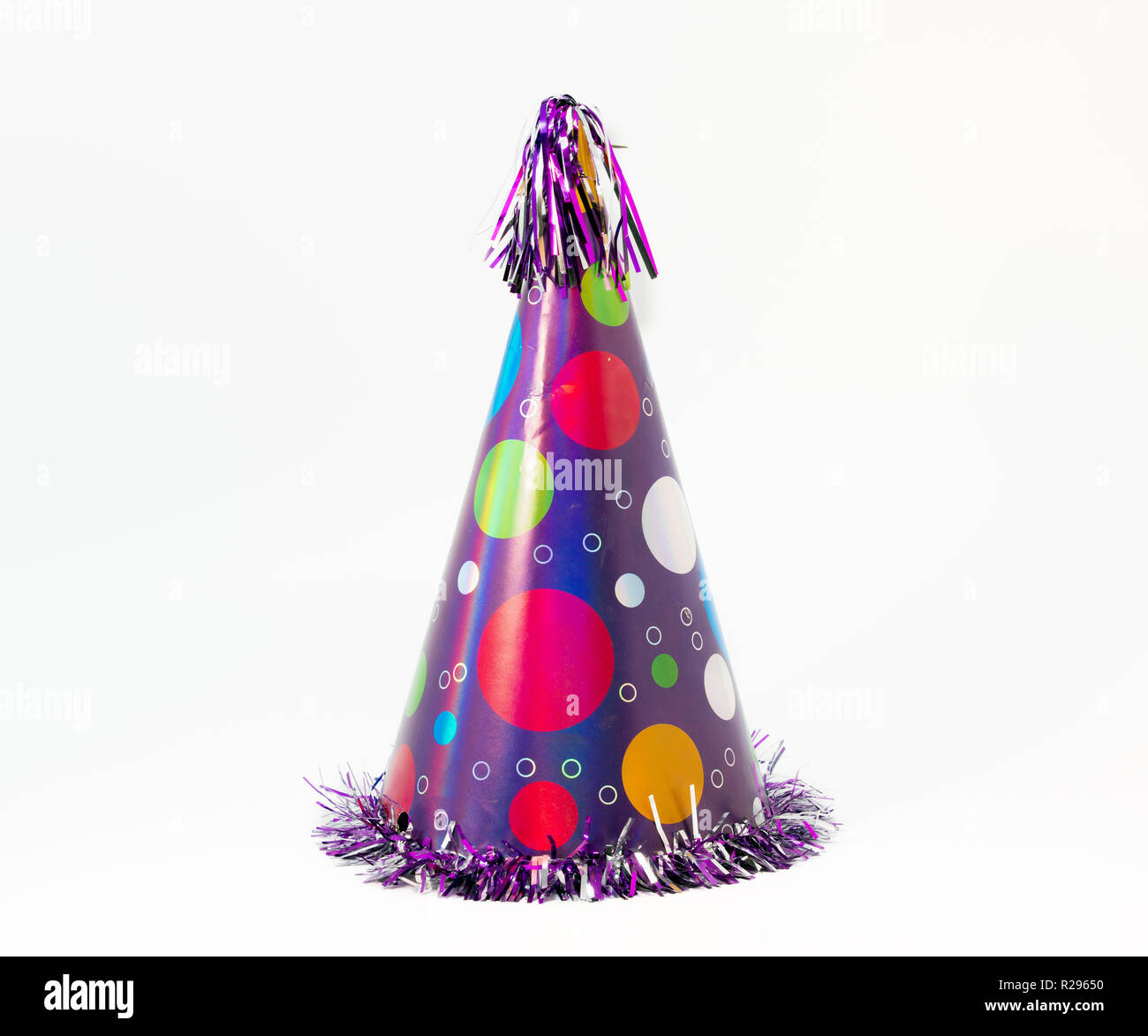 Birthday carton party cone hat with balloons isolated on white ...
