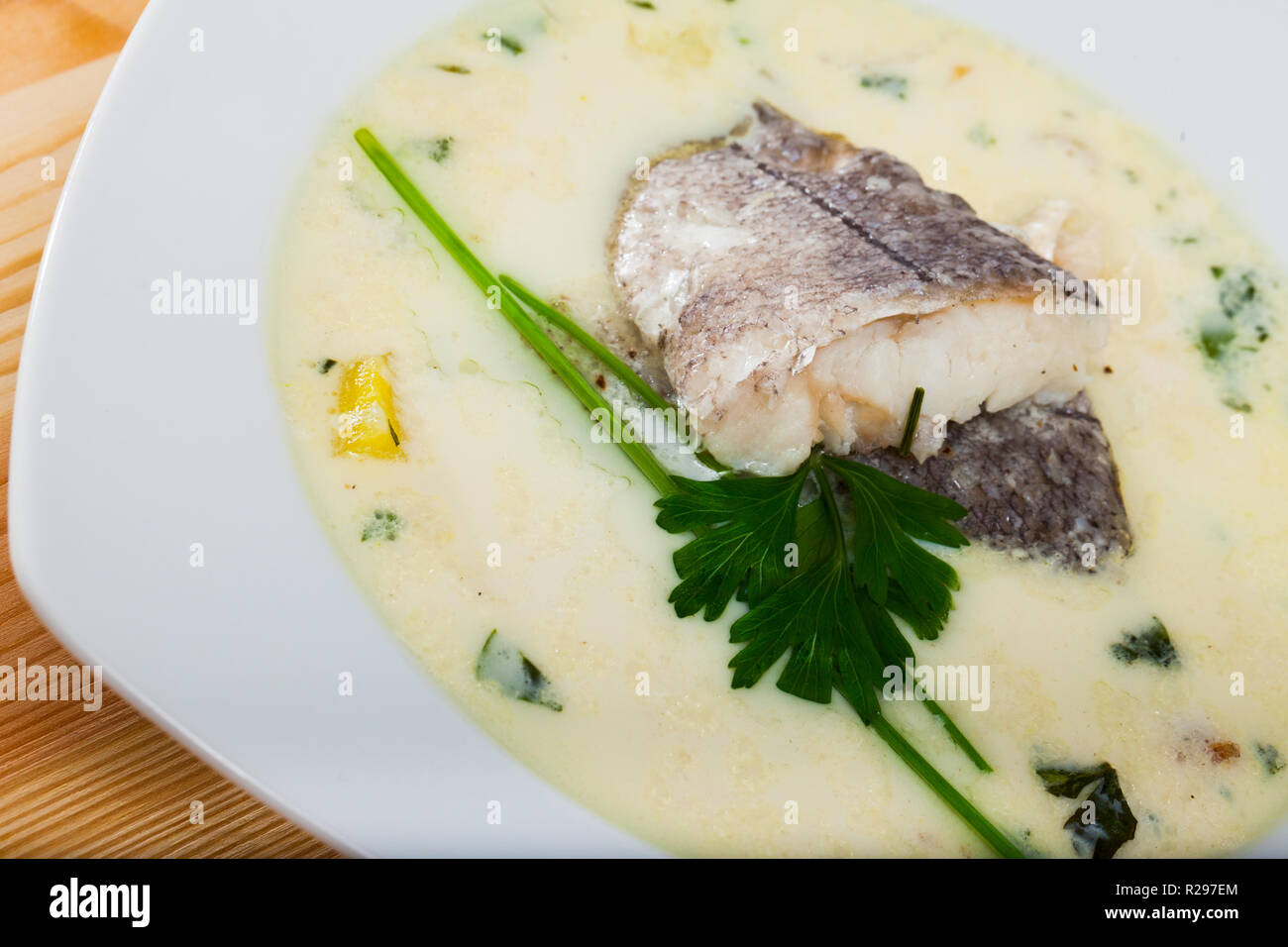 Delicious pollock chowder served in soup plate – traditional dish of ...