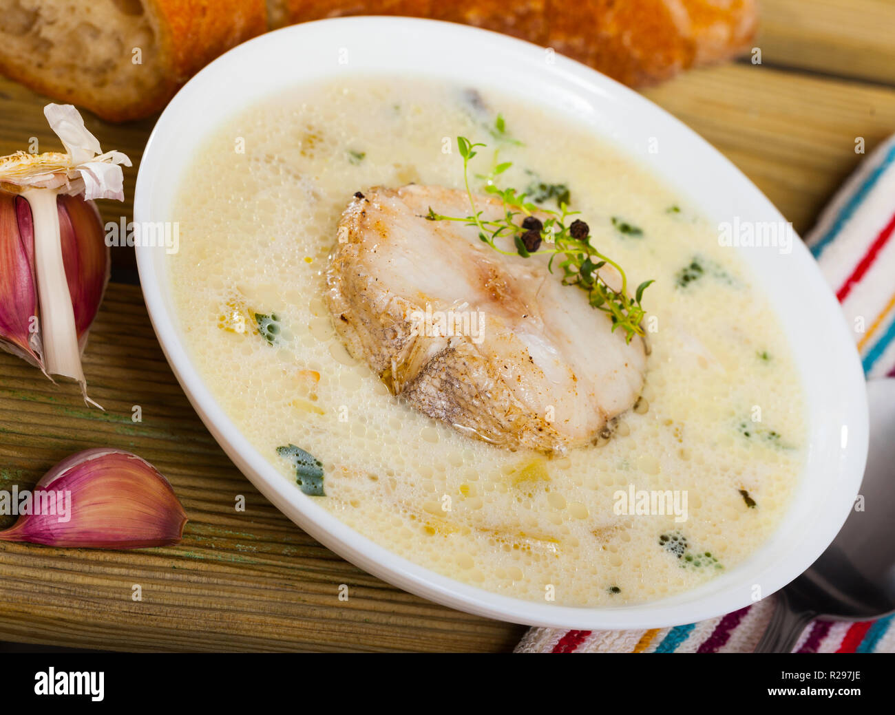 Delicious pollock chowder served in soup plate – traditional dish of ...