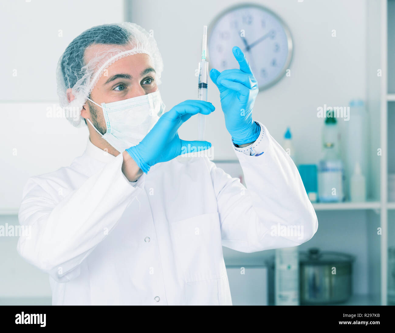 Male nurse preparing injection with syringe in hospital Stock Photo - Alamy