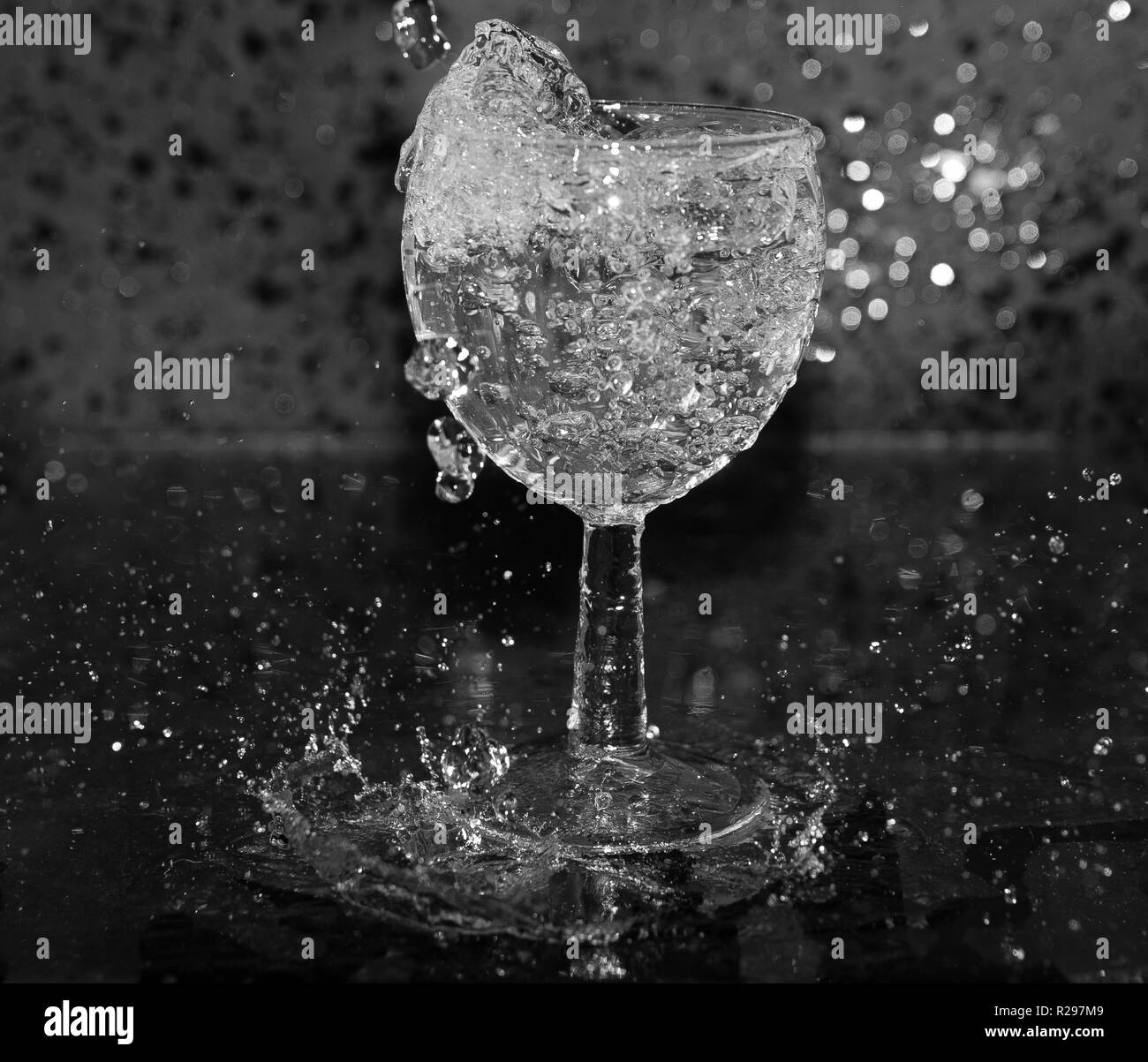 squirt, splash of water on a black background, drops, glass Stock Photo ...
